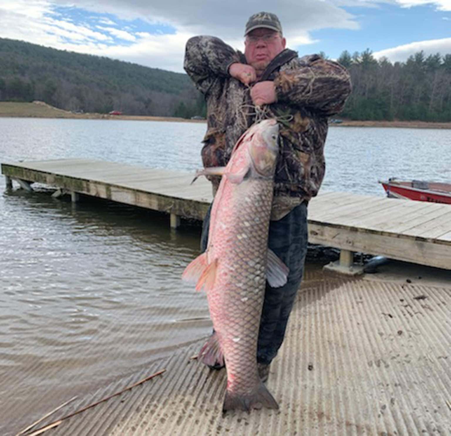 Angler catches record grass carp in February